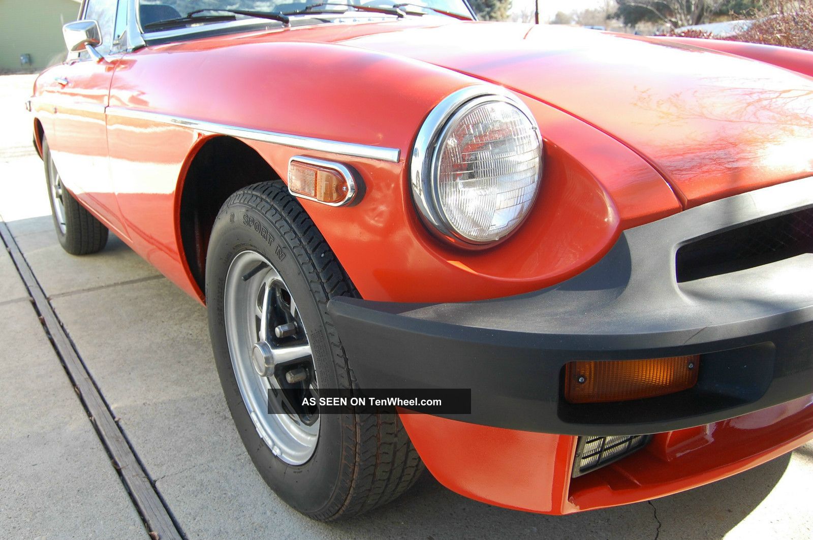 Red 1978 Mgb Roadster.